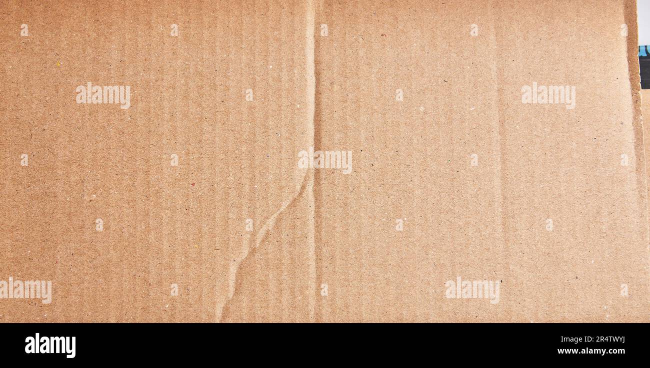 Brown cardboard carton material texture background Stock Photo - Alamy