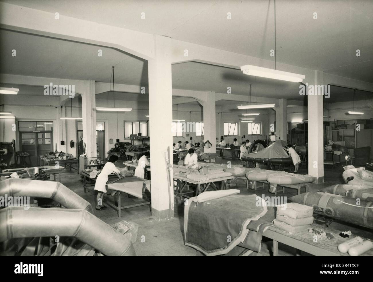 Women at work in the rubber dingy factory, Italy 1960s Stock Photo - Alamy