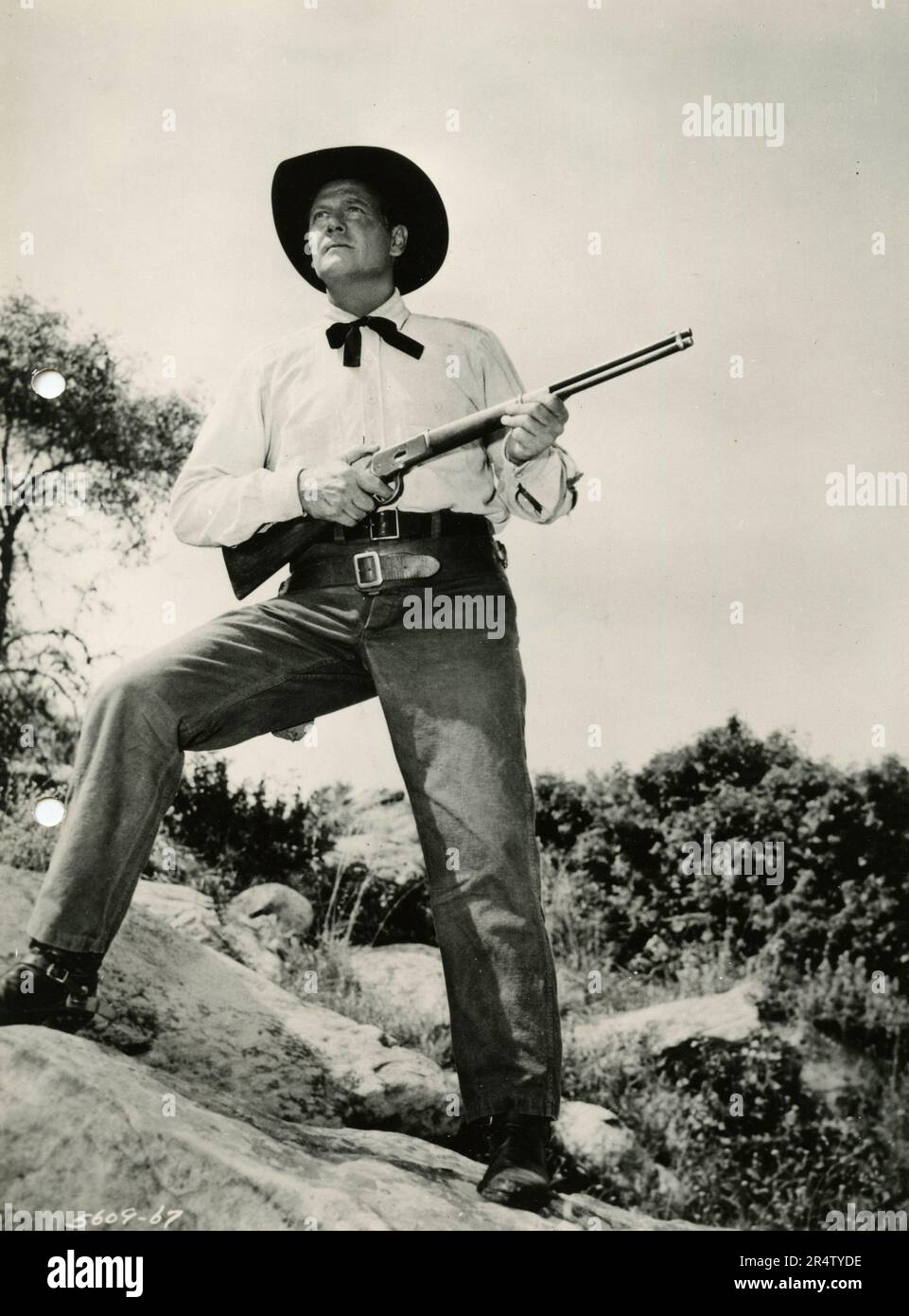 Cowboy with rifle hi-res stock photography and images - Alamy