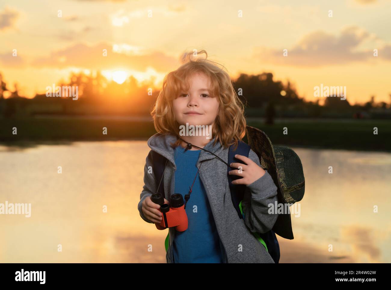 Travel and adventure concept. Little child boy tourist explorer with ...