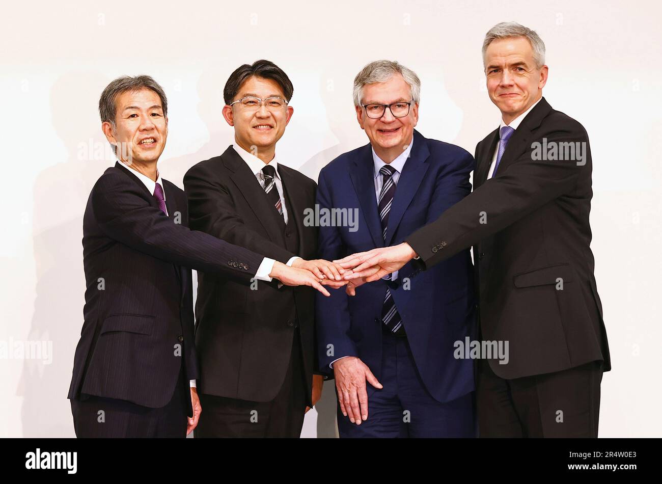 (L-R) Satoshi Ogiso, President of Hino Motors, Koji Sato, President of ...
