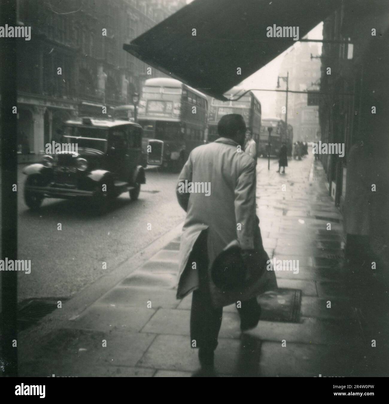 Man walking london hi-res stock photography and images - Alamy