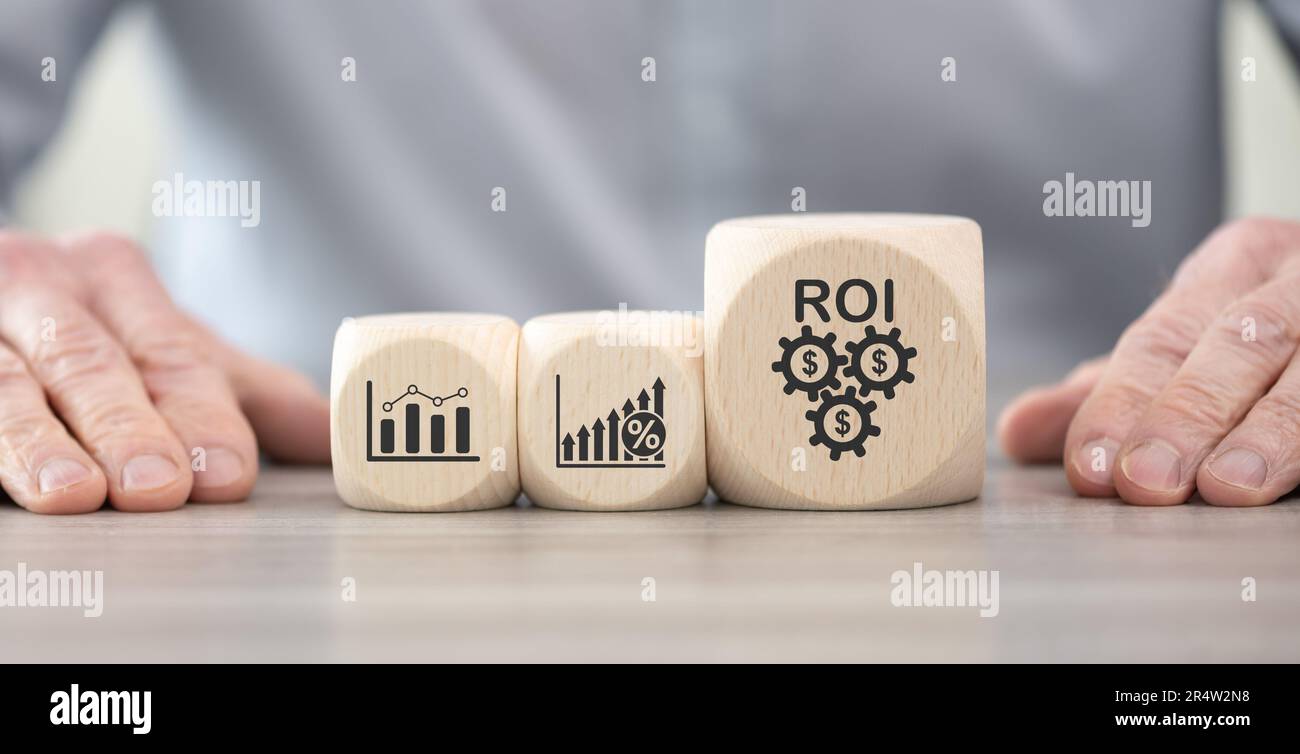 Wooden blocks with symbol of roi concept Stock Photo - Alamy