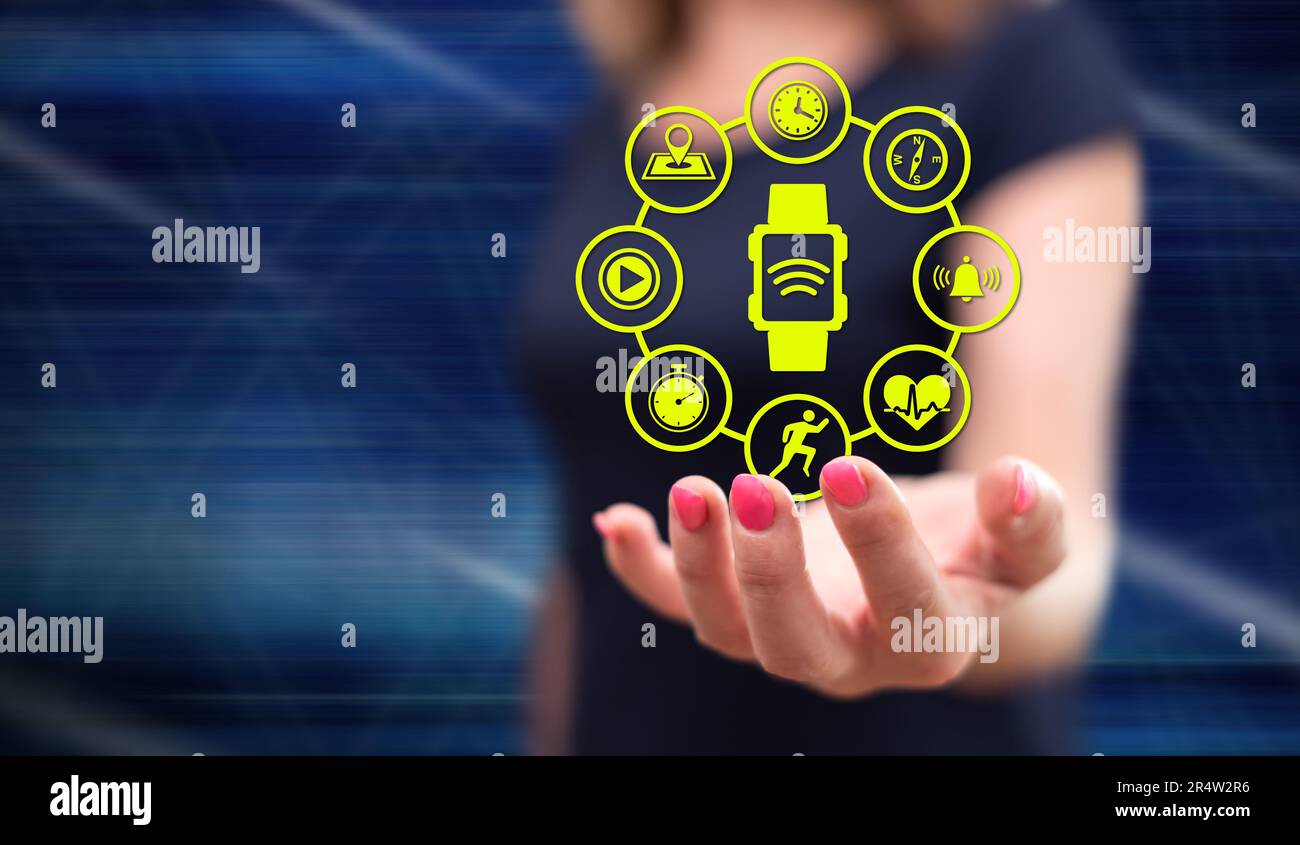 Wearable technology concept above the hand of a woman in background ...