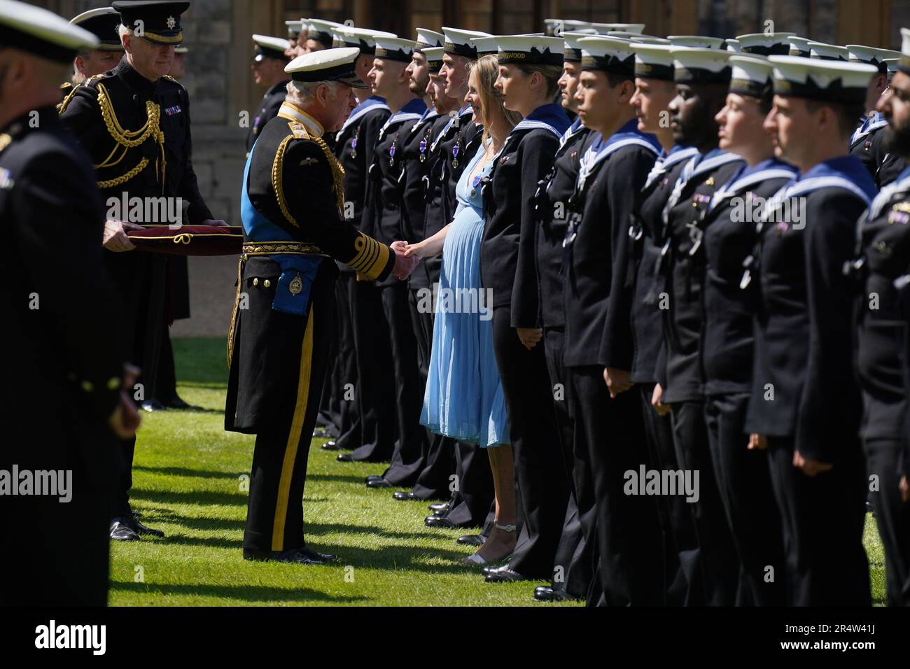 King Charles III presents seven month pregnant Medical Assistant ...