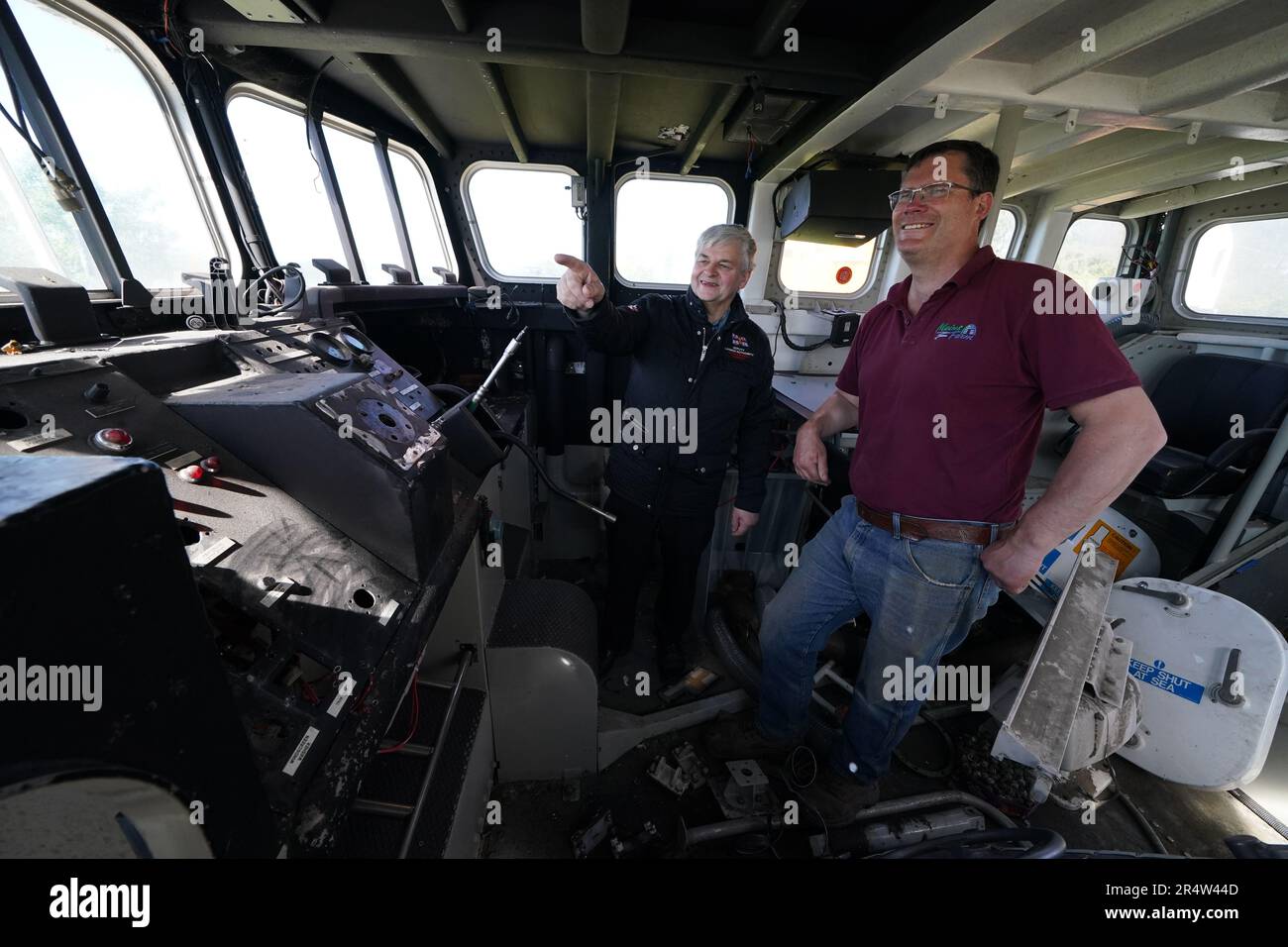 Martyn Steedman alongside David Buchan from the RNLI in the wheelhouse ...