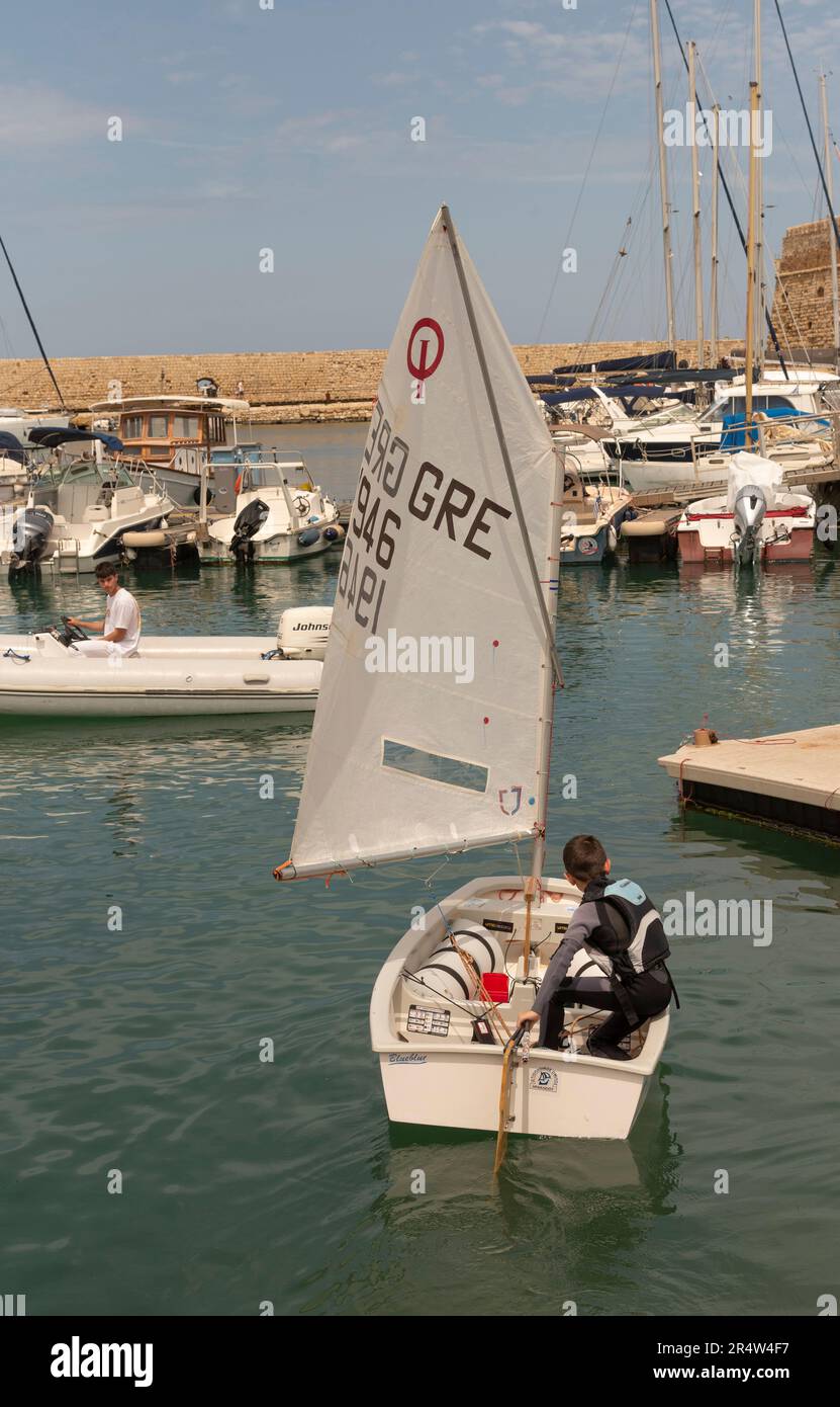 Heraklion, Crete, Greece, Europe. 2023. Young boy taking a sailing ...