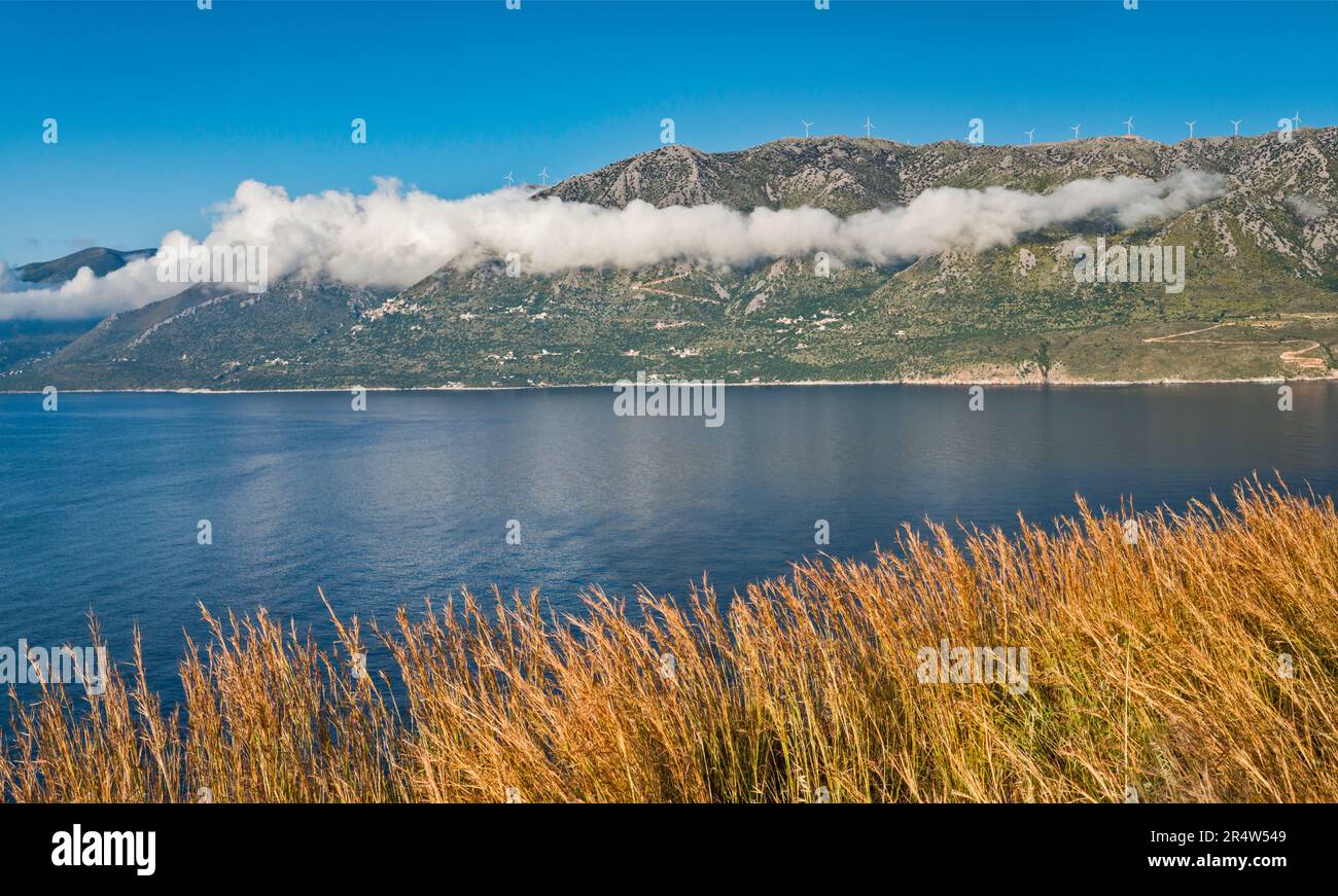 Laconian Gulf harbor near village of Kotronas, wind turbines at Mount ...