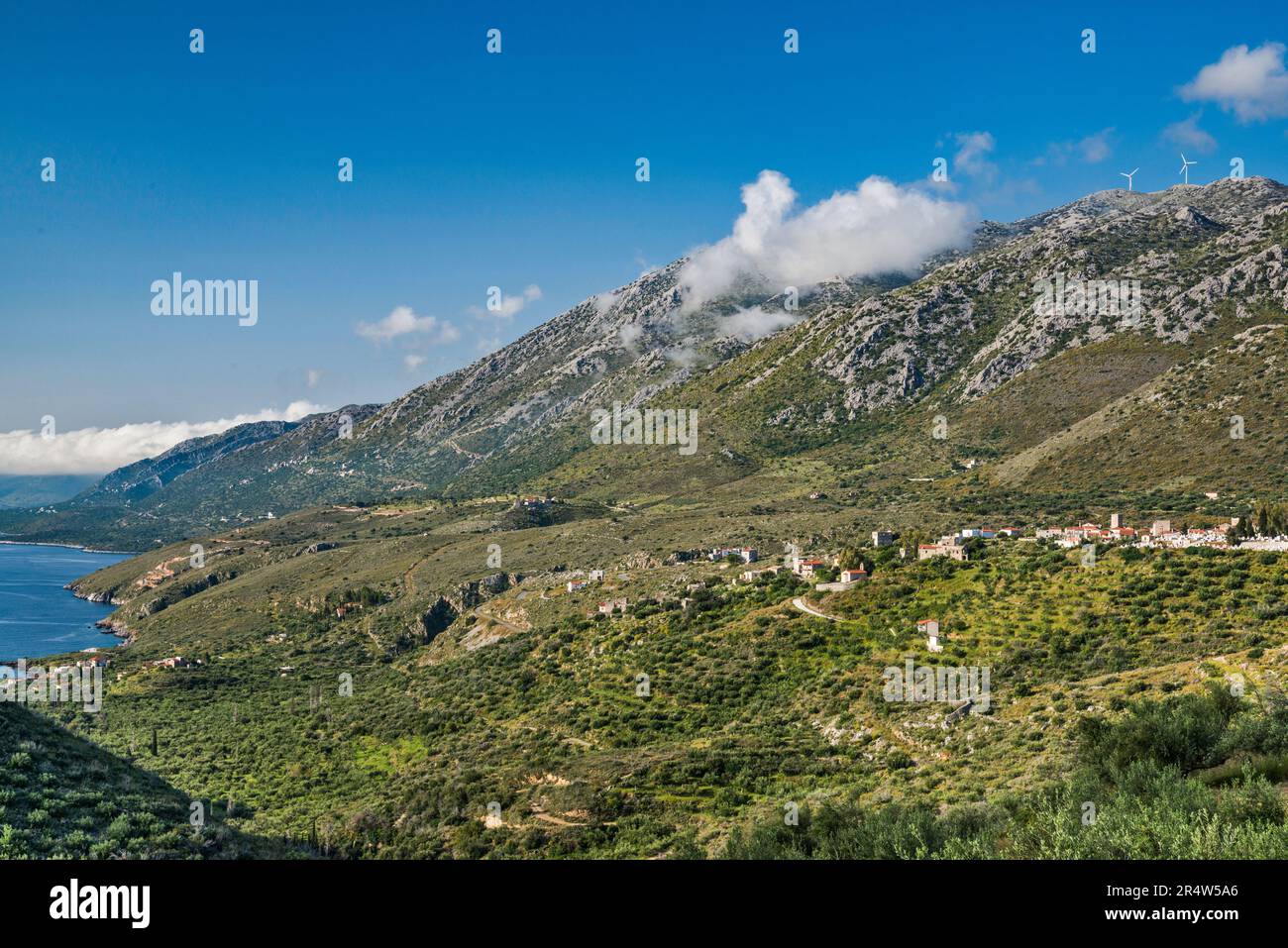 Village of Flomochori, Laconian Gulf, wind turbines at Mount Sangias ...