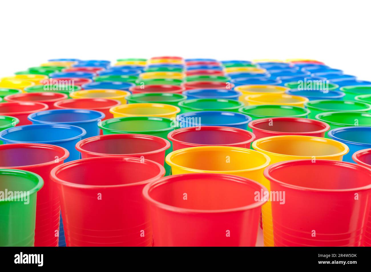 Multicolor plastic glasses isolated on white background Stock Photo - Alamy