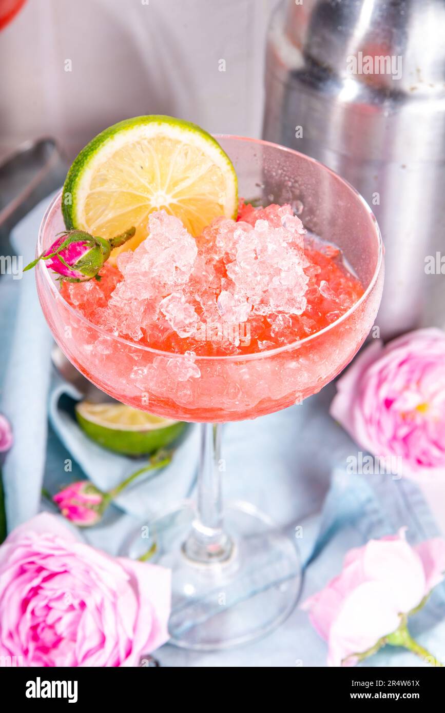 Frozen rose daiquiri or margarita cocktail, champagne, pink rose wine ...