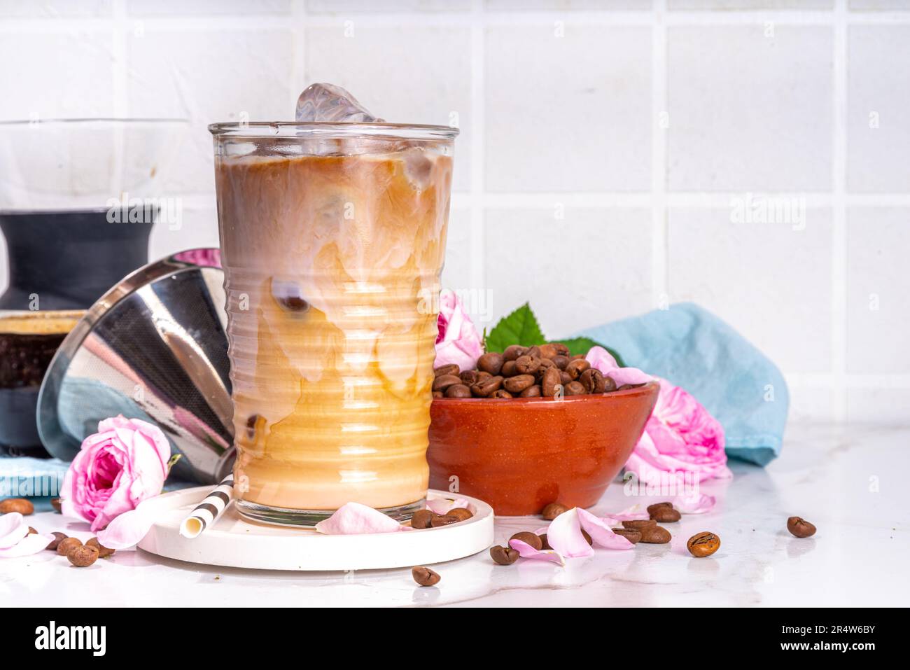 Iced Rose flower latte coffee drink, with pink rose petals taste almond ...