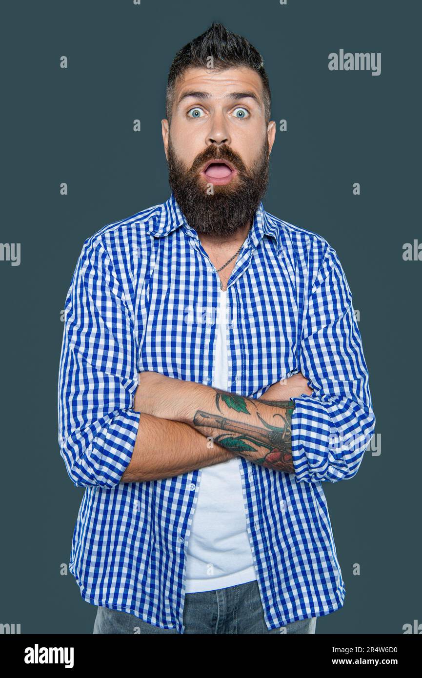 Amazed man wear checkered hi-res stock photography and images - Alamy