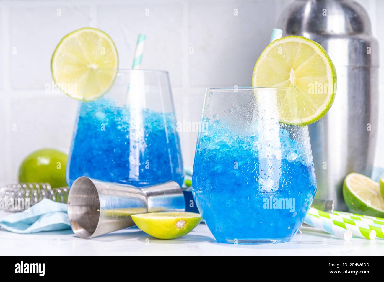 Iced blue curacao cocktail, drunken mermaid alcohol cocktail drink with ...