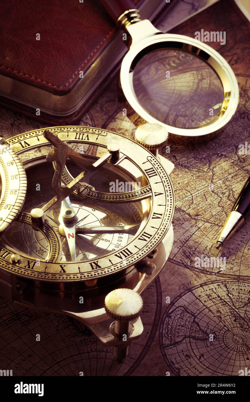 Old vintage compass and travel instruments on ancient map Stock Photo ...