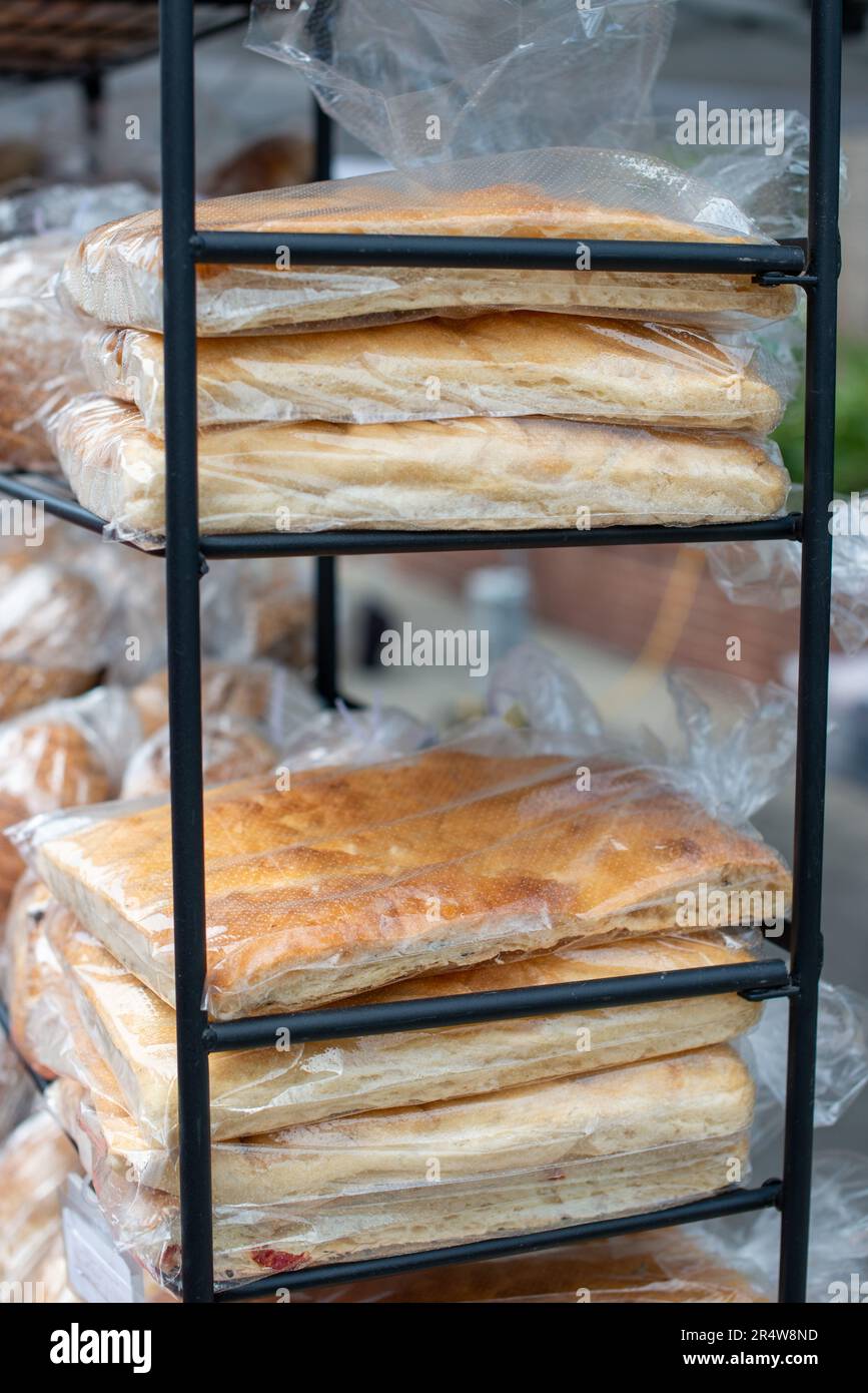 A stack of traditional Italian rosemary garlic focaccia bread on a ...