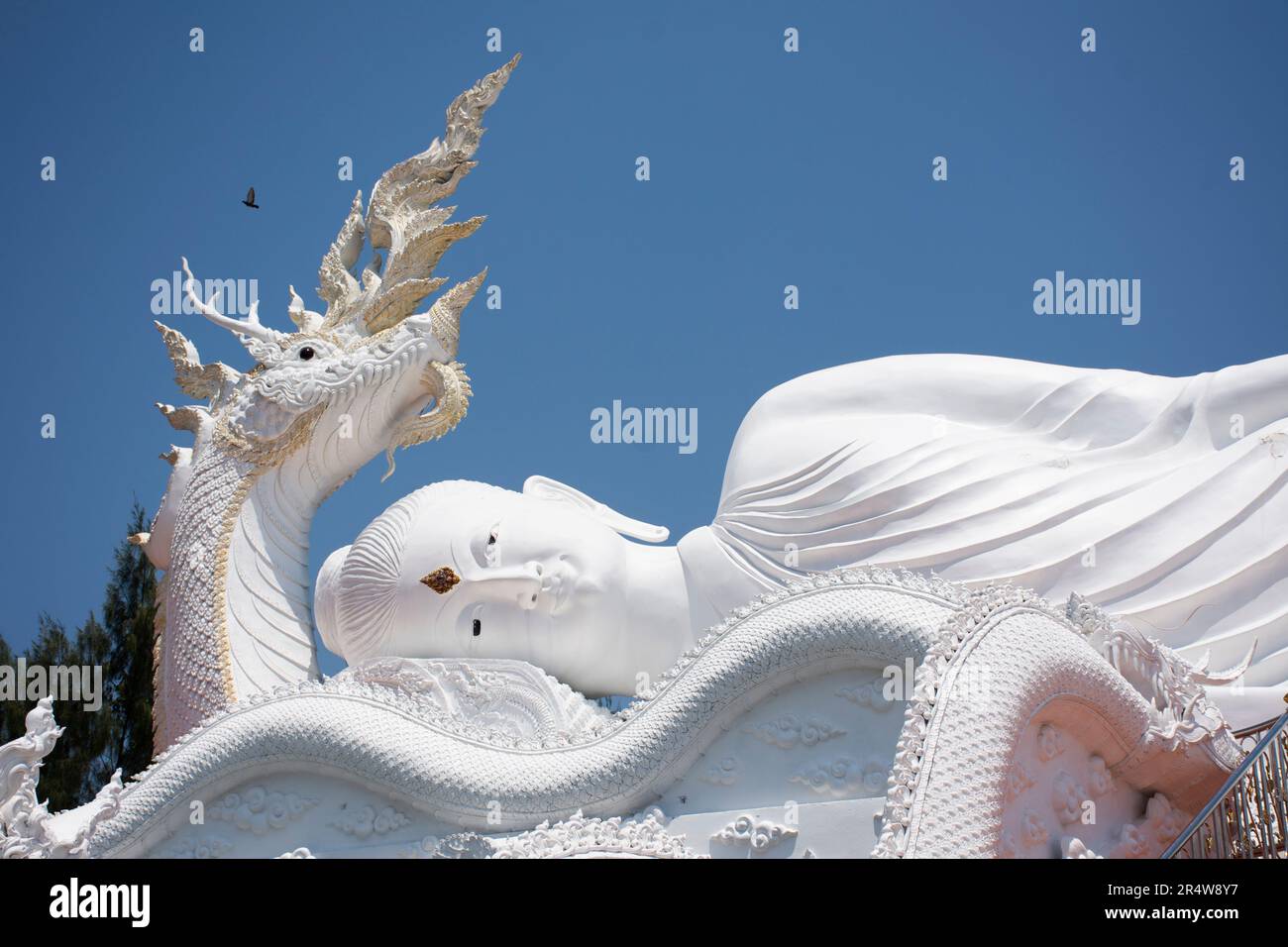 Ancient buddha statue and antique naga guardian for thai people ...