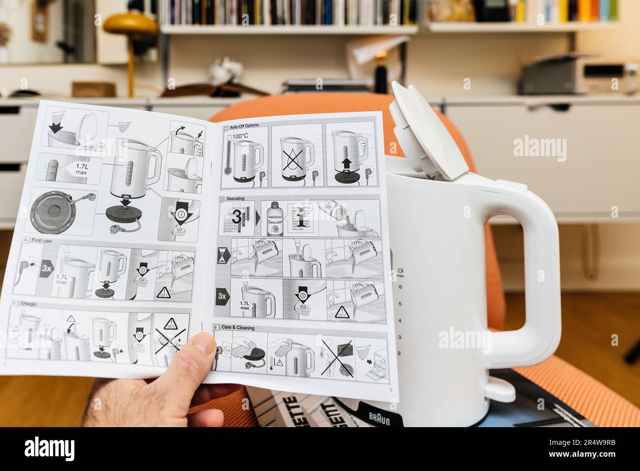 Paris, France - Jan 23, 2023: POV male hand unboxing Braun Breakfast1 ...