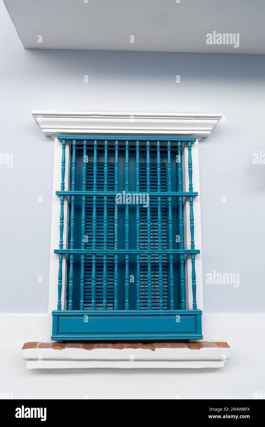 house with blue window outdoor. building with window outside. window ...