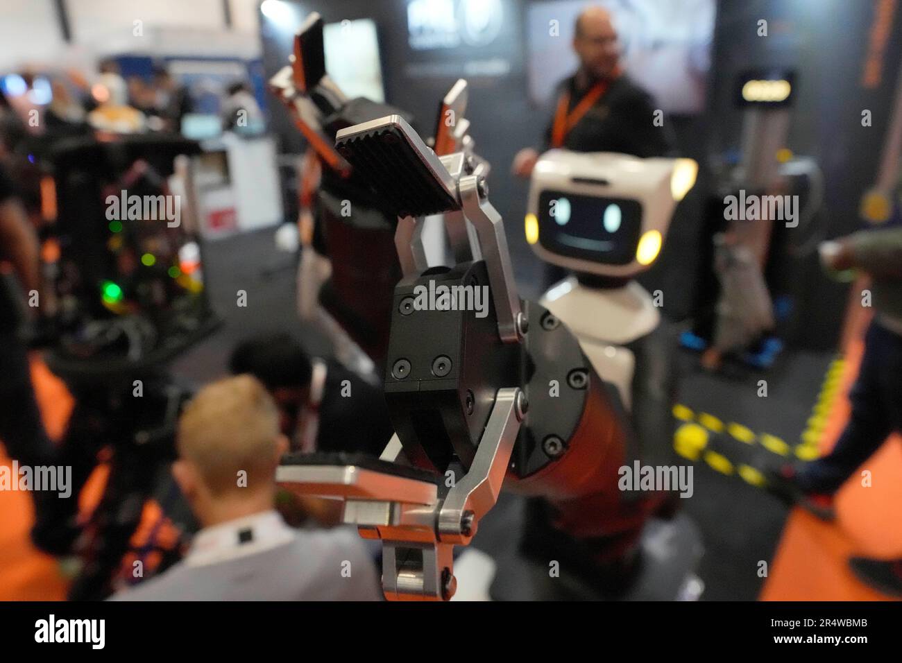 A robot shows it's grips during the International Conference on ...