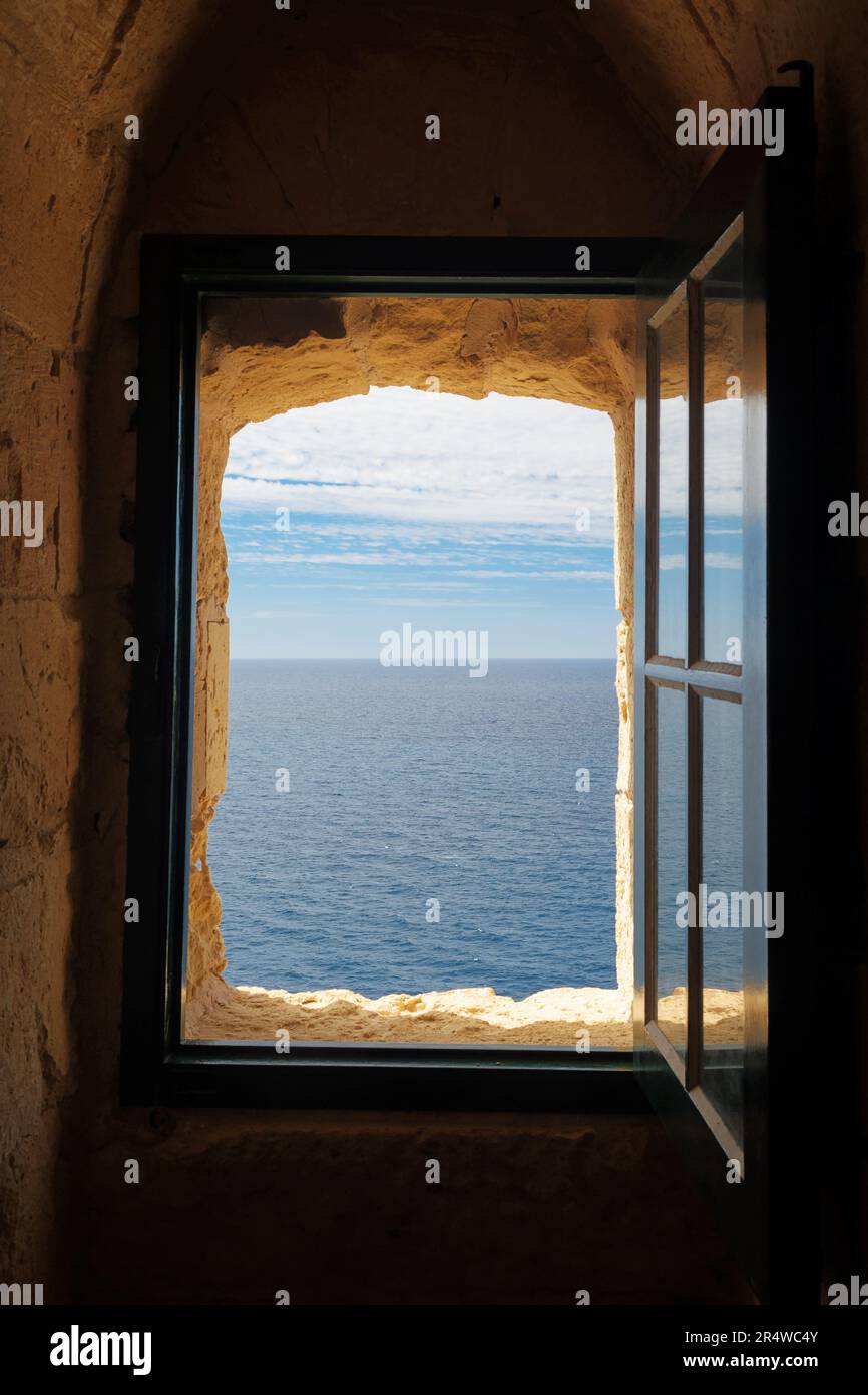 Looking at the Mediterranean sea through an old window of a defense ...