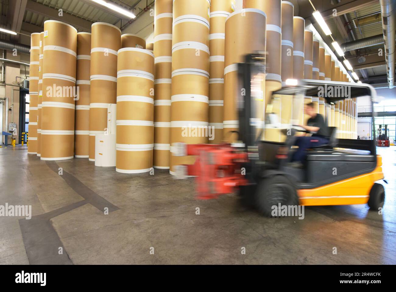 Storage of paper rolls in a large print shop - transport with a ...