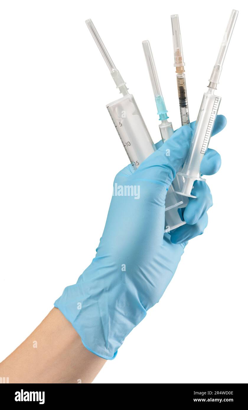 Syringe in hand isolated on white Stock Photo - Alamy