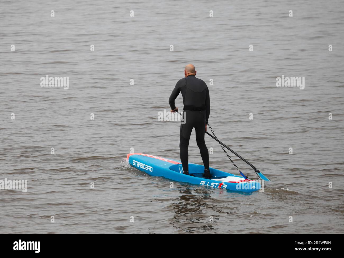 Paddleboard and sea hi-res stock photography and images - Alamy