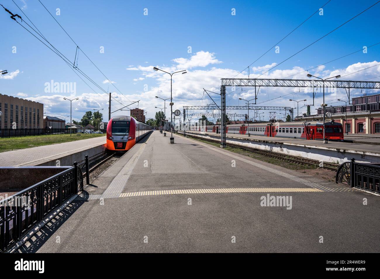 A modern railway station with commuter trains. trips to work Stock ...