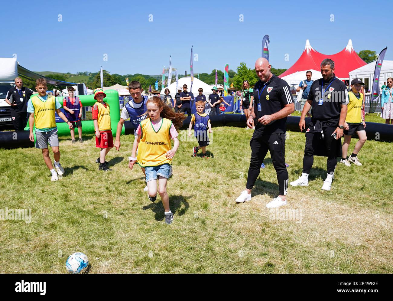 Wales manager Rob Page watches a football training session for children ...