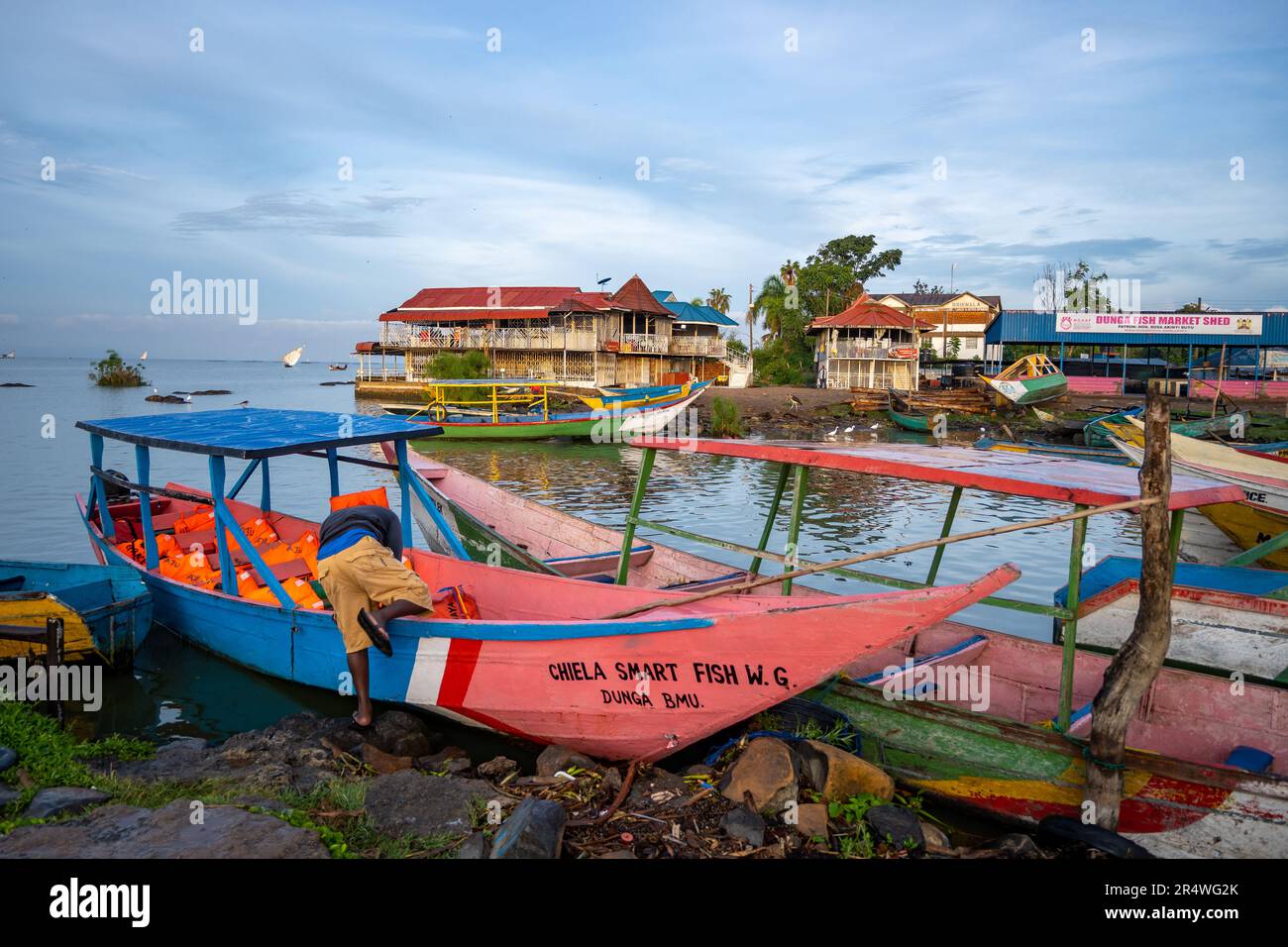 Colorfully painted boats in Lake Victoria. Kenya, Africa Stock Photo ...