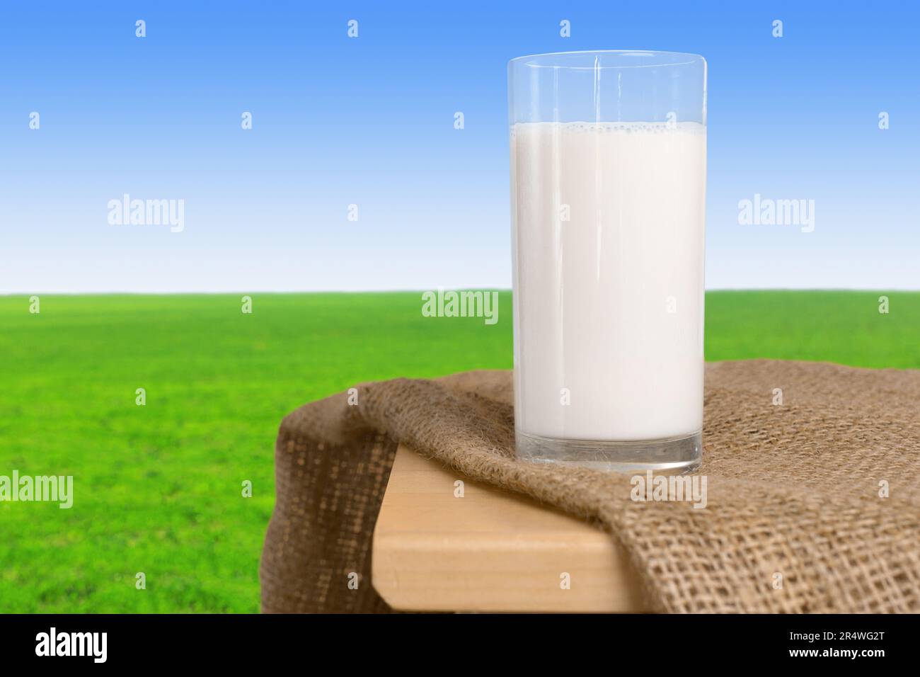 Milk on a table with a natural background Stock Photo - Alamy