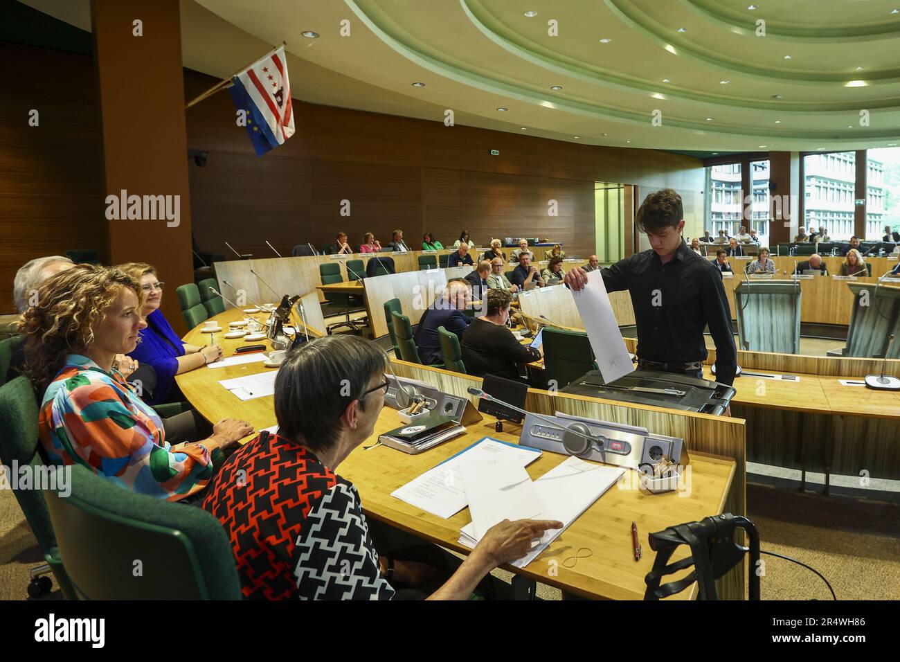 ASSEN - Member of Parliament Bjorn Schutte (18 years old, BBB) casts a ...