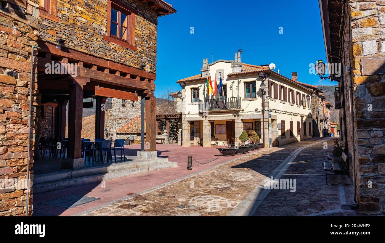 Main street of a small mountain village with the town hall and other ...