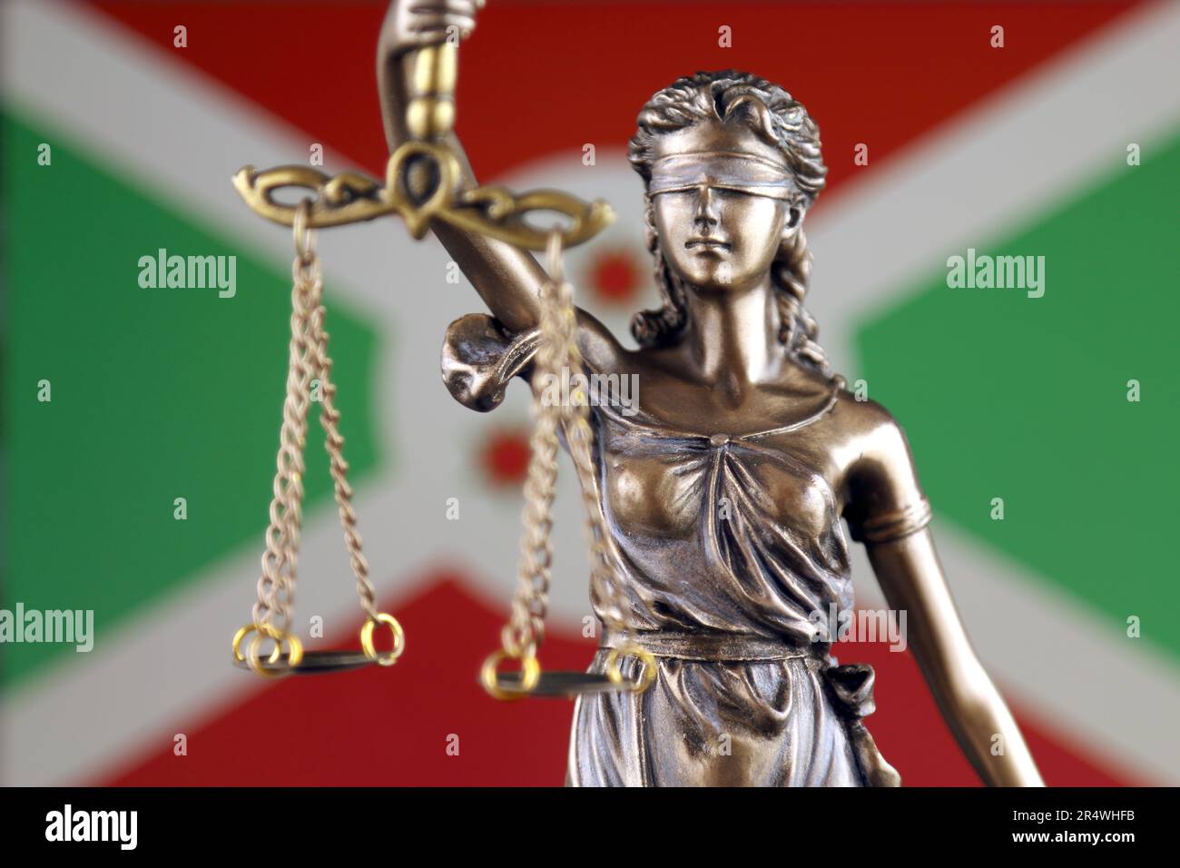 Symbol of law and justice with Burundi Flag. Close up Stock Photo - Alamy