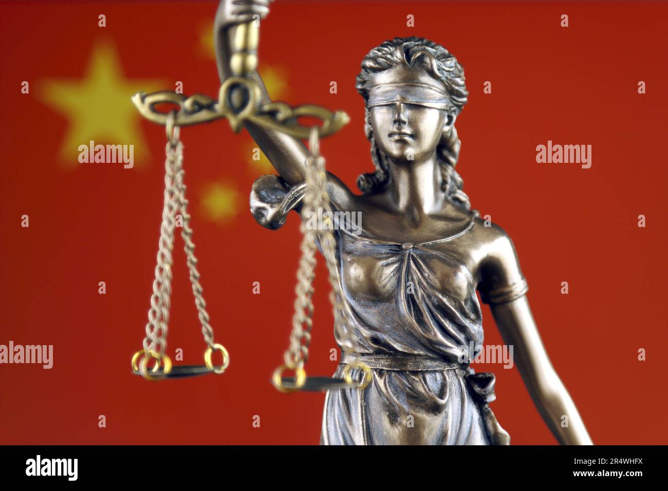 Symbol of law and justice with China Flag. Close up Stock Photo - Alamy