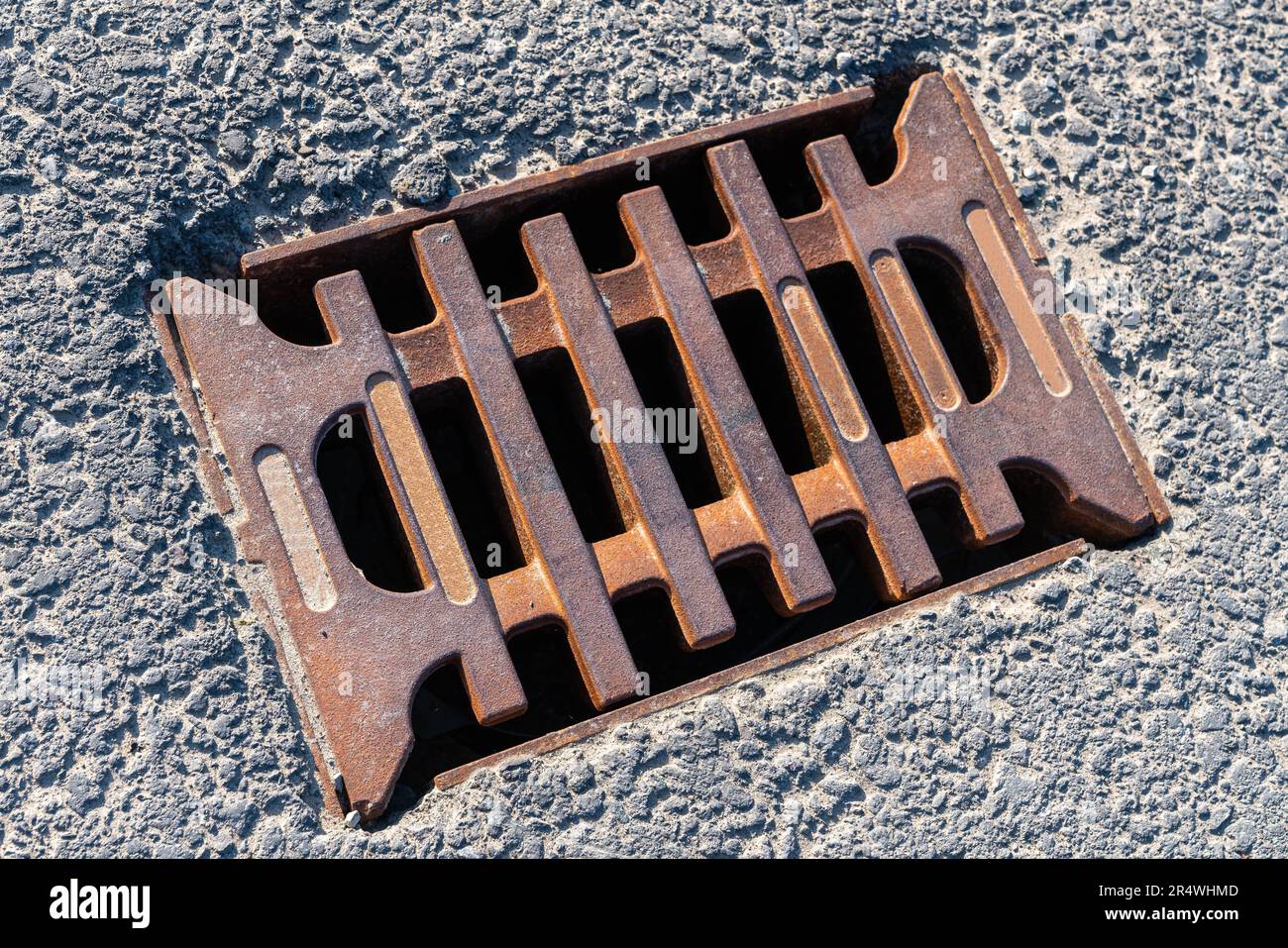 Top view of a rusty cast iron storm drain grate. Close up Stock Photo ...