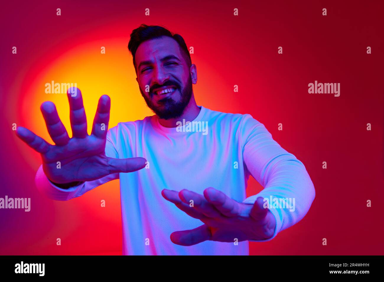 Delightful. Portrait of handsome bearded man smiling, laughing, posing ...