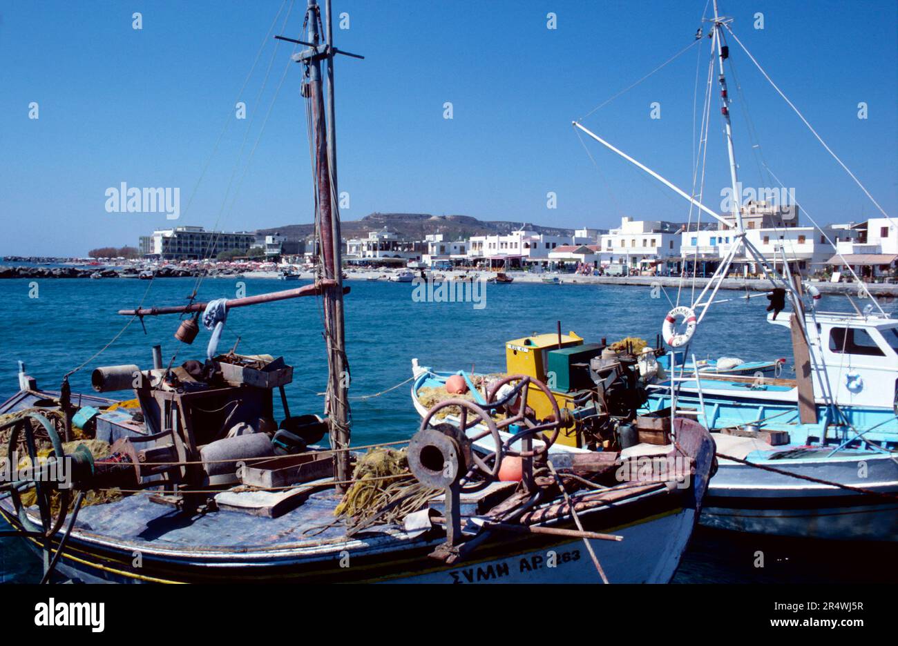 Greece. Dodecanese Islands. Kos. Harbourside fishing boats Stock Photo ...