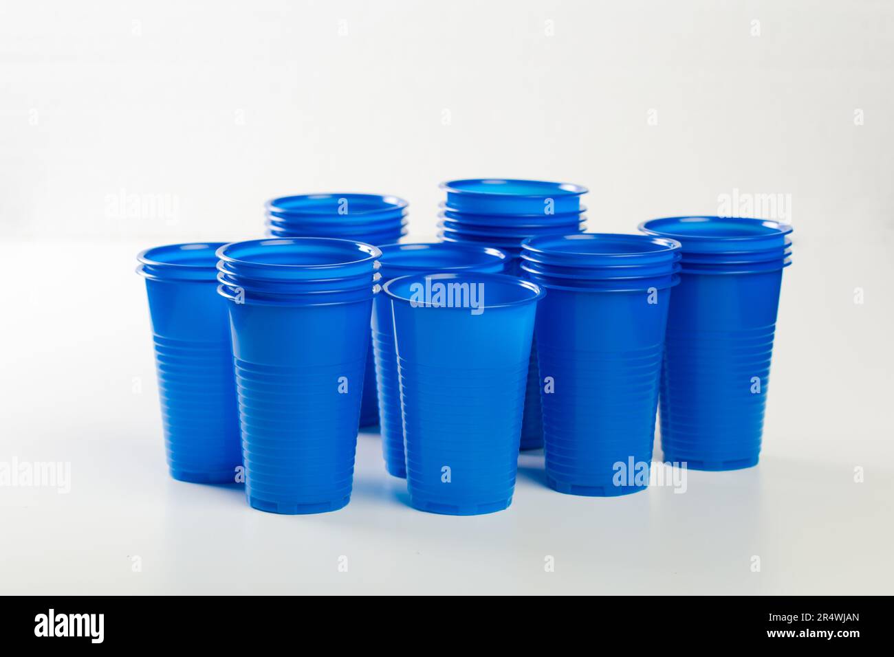 blue disposable plastic glasses Stock Photo - Alamy