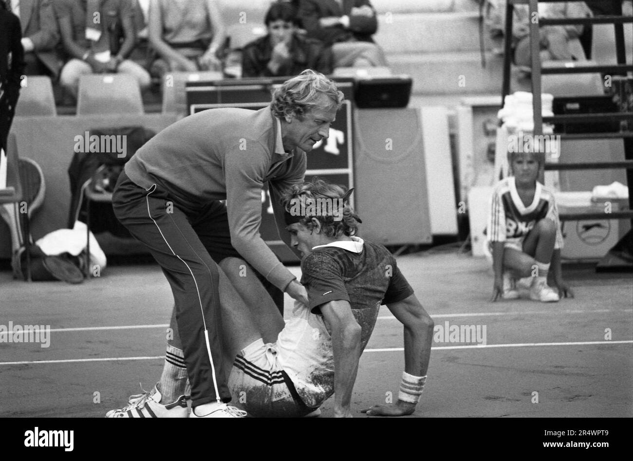 The captain of the French tennis team helping French player Gilles ...