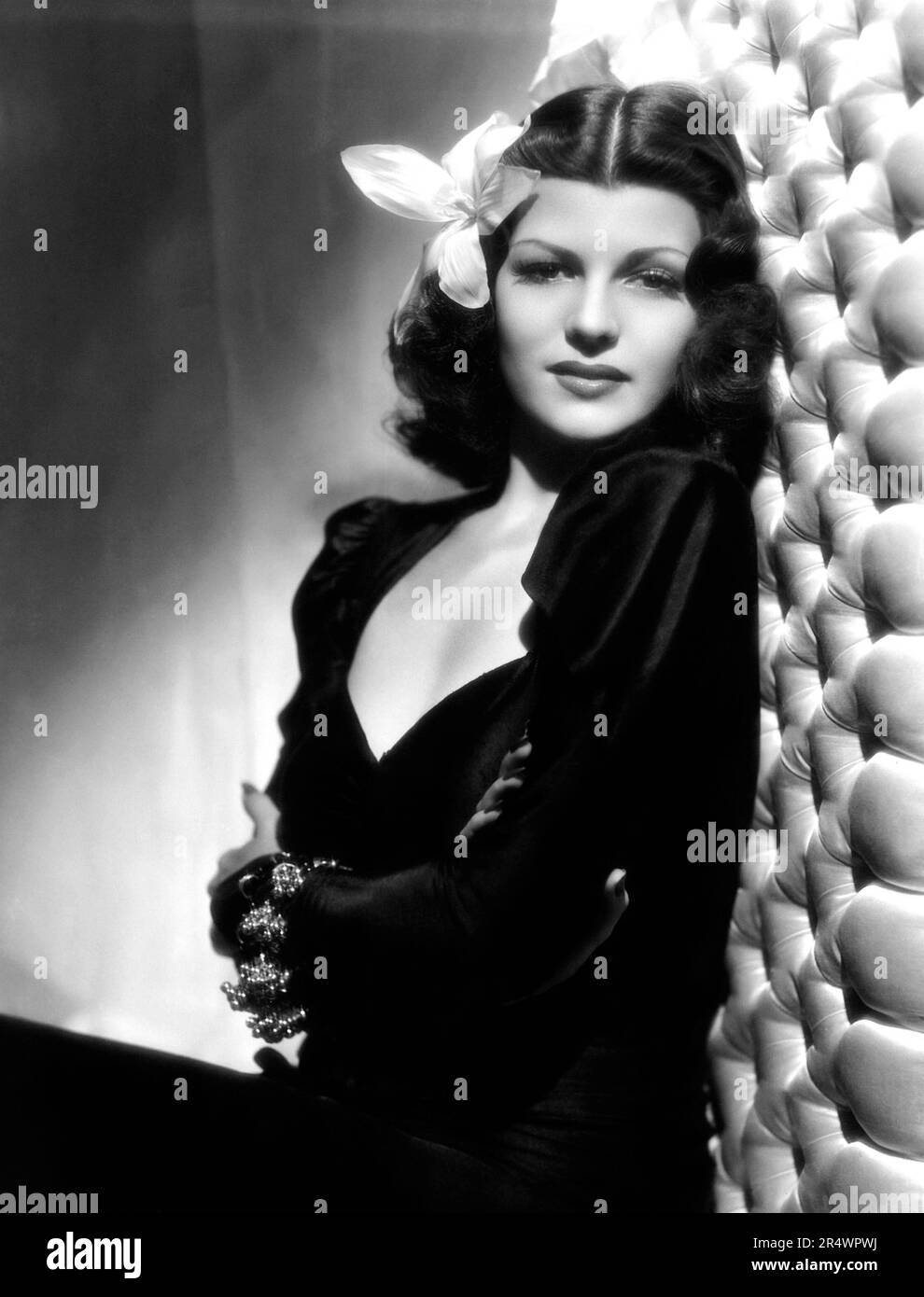 Rita Hayworth with an exotic flower in her hair Stock Photo - Alamy
