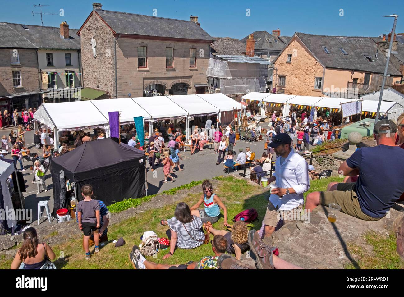 Hay Festival visitors enjoying the fair in the town centre square Hay ...