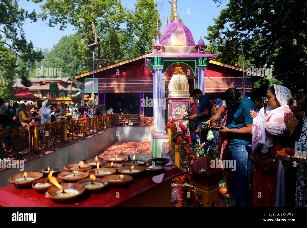 Srinagar, India. 28th May, 2023. Kashmiri Pandit (Hindu) devotees pray ...
