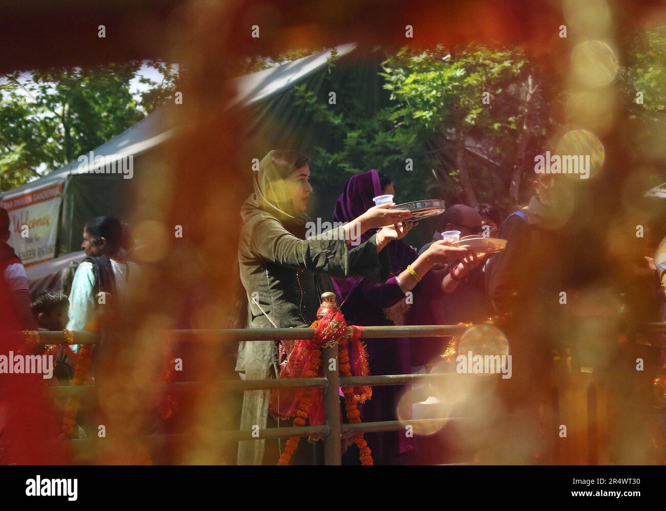Srinagar, India. 28th May, 2023. Kashmiri Pandit (Hindu) devotees pray ...