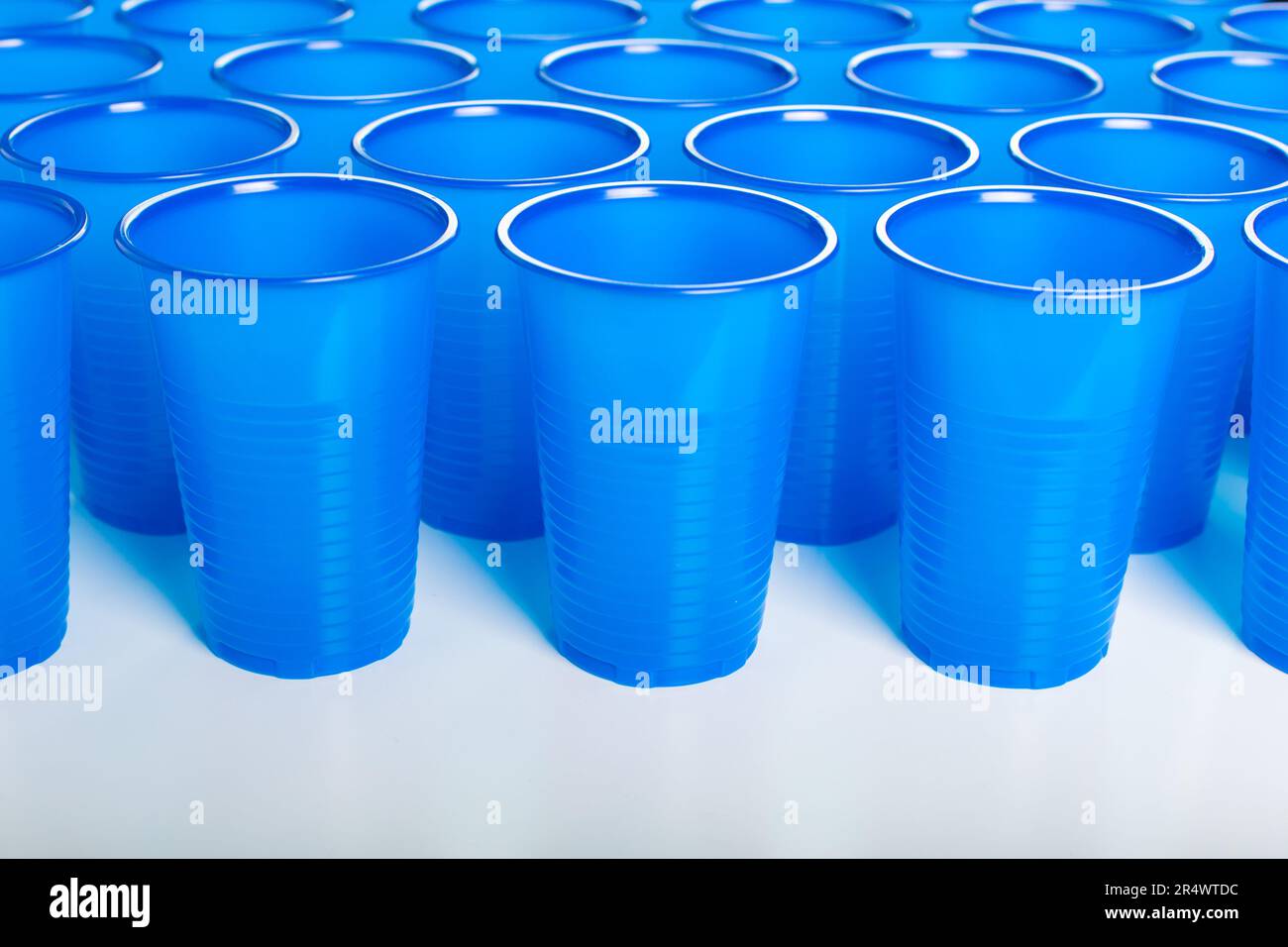 blue disposable plastic glasses Stock Photo - Alamy