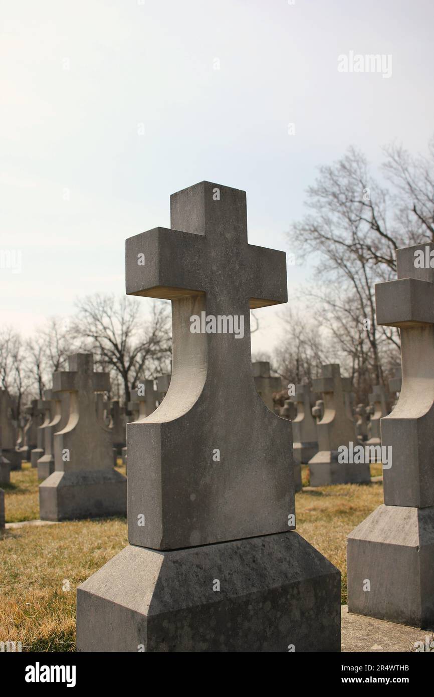 Simple plain stone cross standing in the sunny cemetery Stock Photo - Alamy