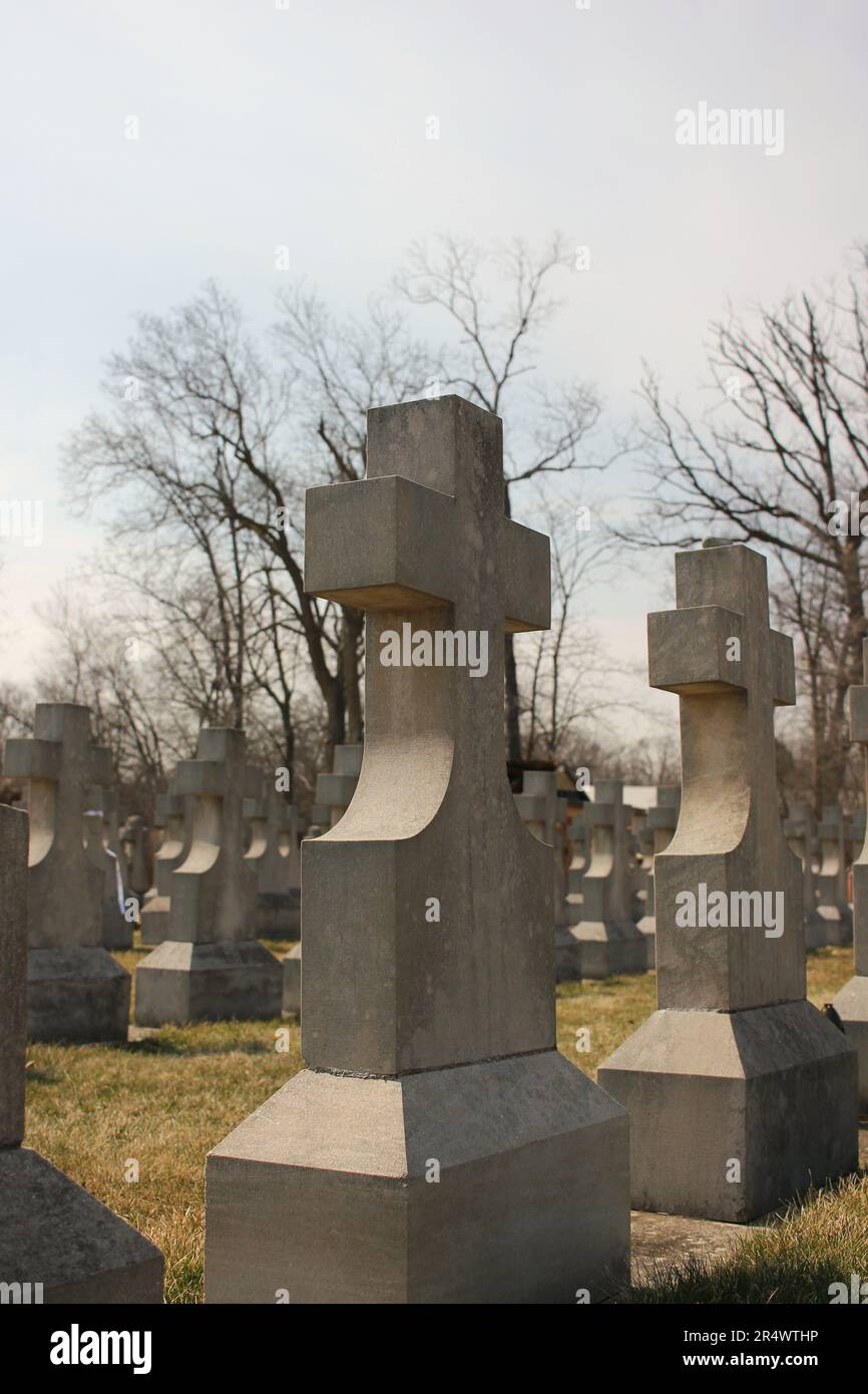 Simple plain stone cross standing in the sunny cemetery Stock Photo - Alamy