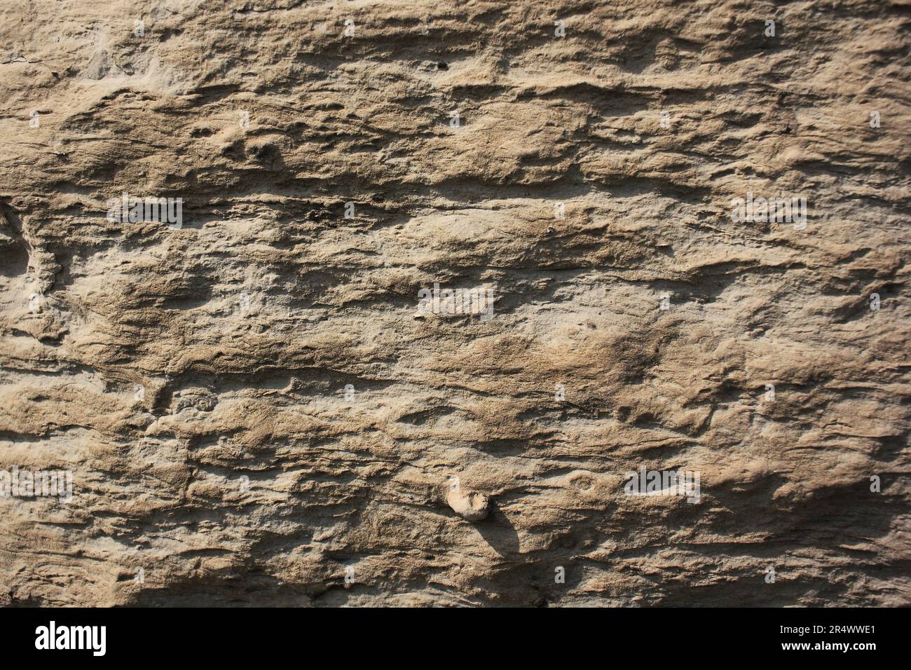 A worn and weathered natural stone wall with lots of texture Stock ...
