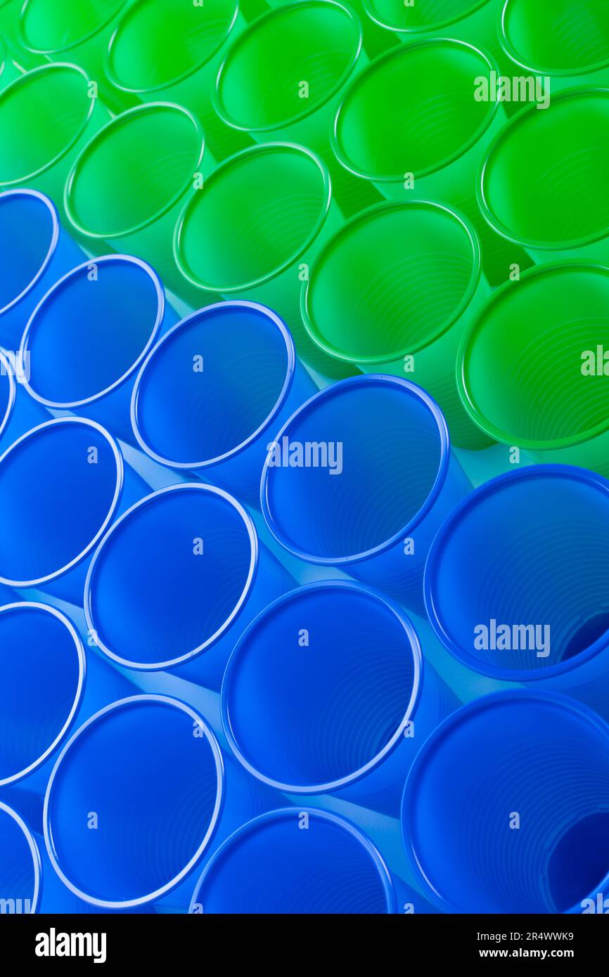 Multicolor plastic glasses isolated on white background Stock Photo - Alamy